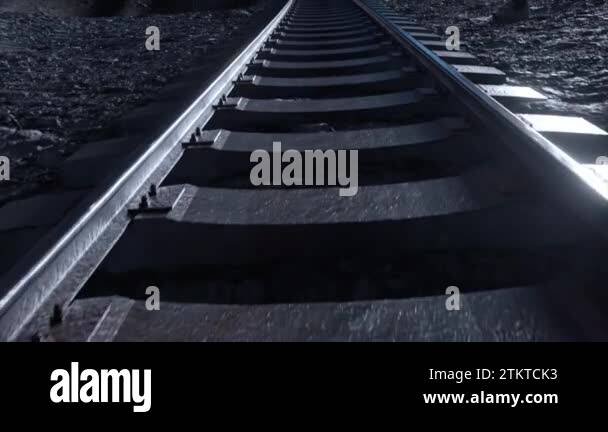 A cosmic train travels along rails on a moon surface with a view of a ...