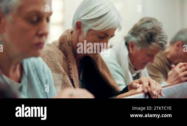 Senior, prayer and people in a church for a service, worship or ...