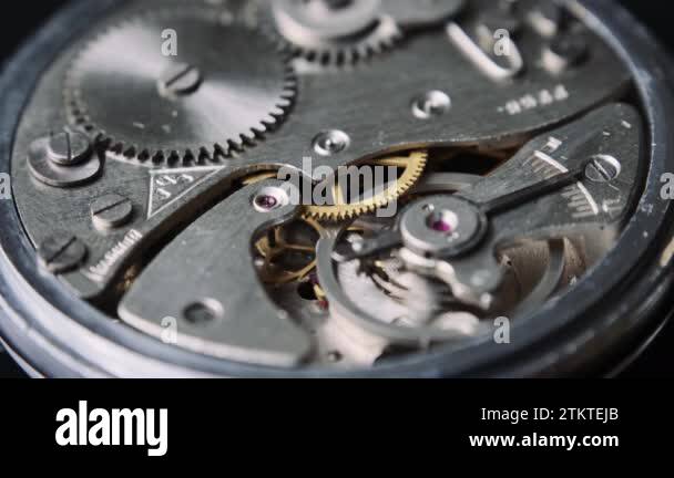 Mechanism of vintage stopwatch close-up. Round clock watch mechanism ...