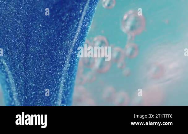 Glitter fluid drip. Paint flow. Blue color shiny sparkling metallic ...