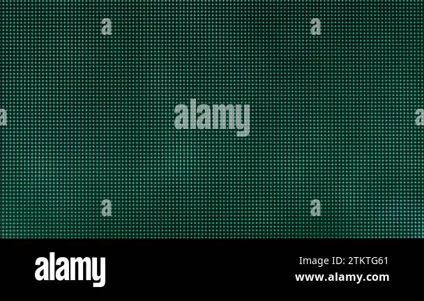 Macro view of a television LED screen with RGB sub-pixels. Colored ...