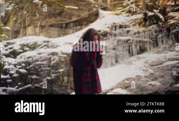 Female traveler finds inner peace in the beauty of nature, hiking through mountain ranges, and ...