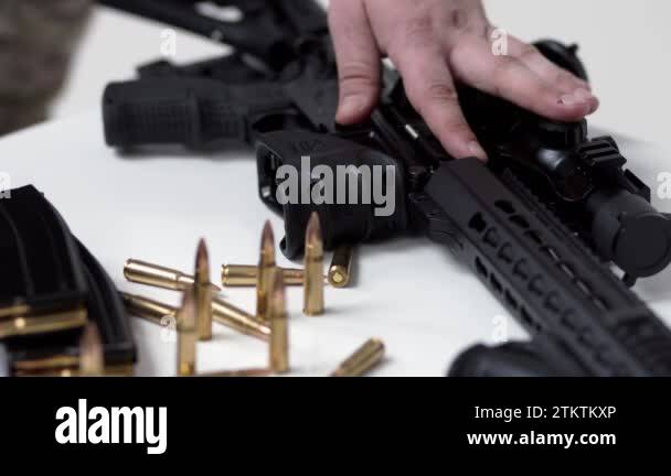 Black iron modern army military machine gun and cartridges, small arms ...