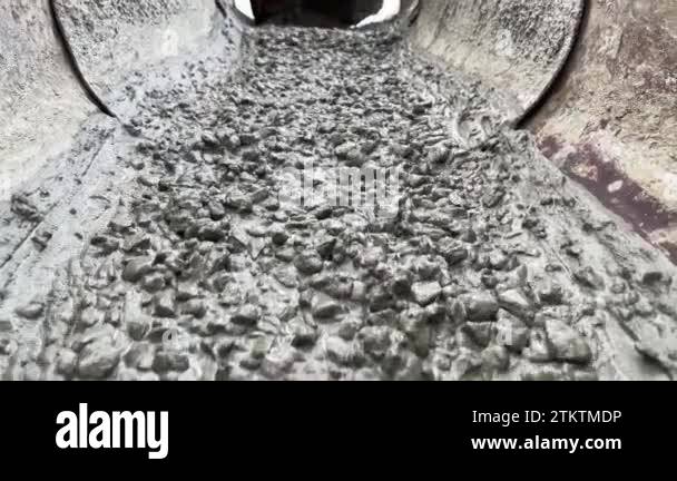 Pouring concrete mix on concreting form work. Forming, an essential ...