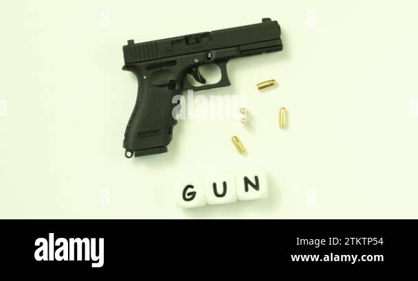 Gun and bullet black pistol isolated on white background. Safety rules ...