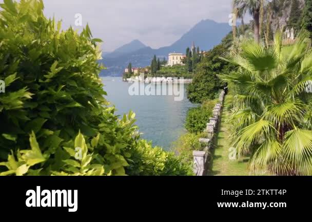 Lush greenery in the park on the shore Lake Como, Italy. Variety of ...