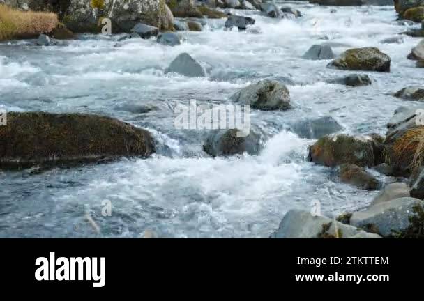 Pure Water Stream Running Through Stone Boulders. Wild Mountain River ...