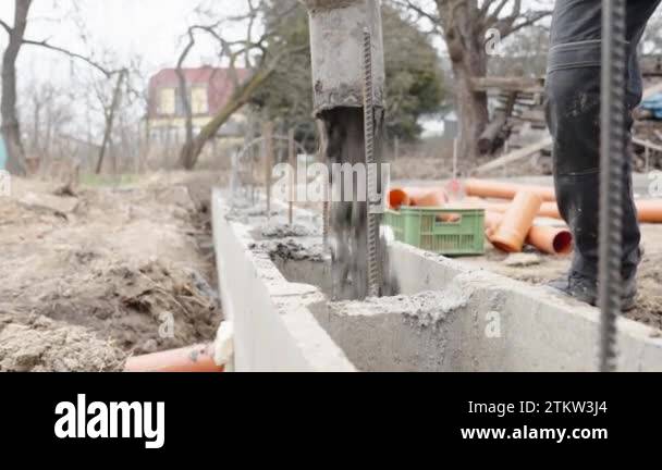 concreting the foundation of the house from the lost formwork Stock ...