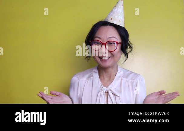 man smashing his friend's face into birthday cake having fun. Portrait ...