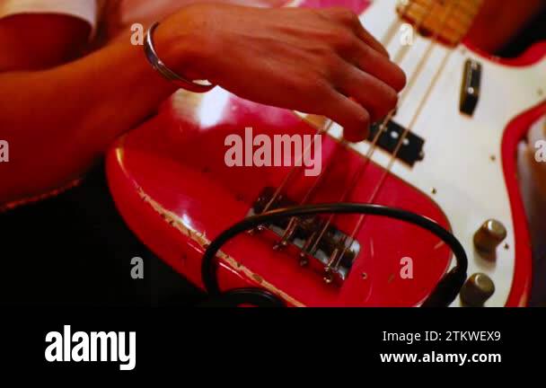 Stage lights.Musical background.Playing bass guitar and concert concept ...