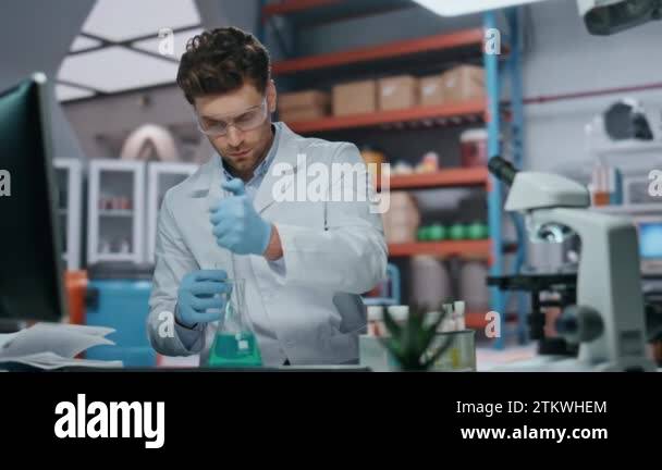 Doctor making laboratory investigation in modern clinic close up ...