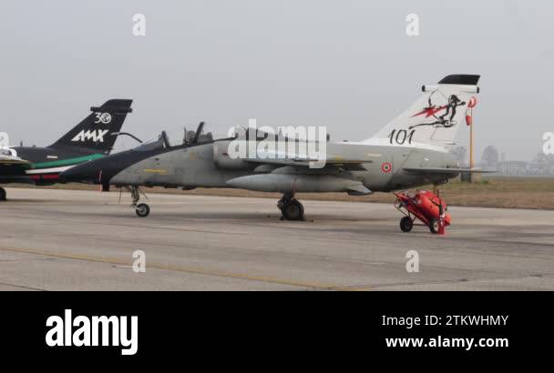 Military jet parked with an archer painted on its tail as it nocks a ...