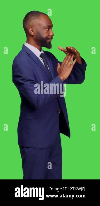 Vertical video: Side view of displeased employee doing timeout pause ...