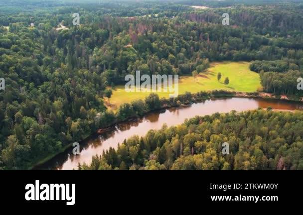 River Gauja in the Latvian nature park. Turaida Castle on the banks of ...