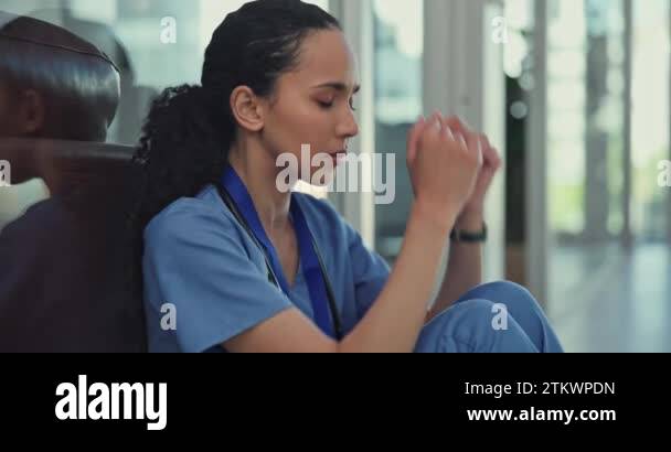 Sad female nurse hospital corridor Stock Videos & Footage - HD and 4K ...
