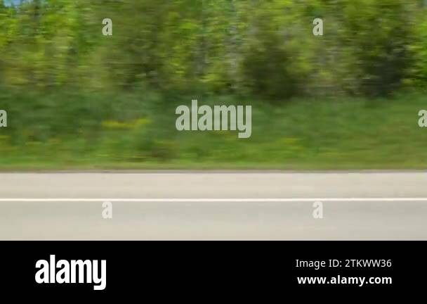 Side view forward driving Plate Passenger POV driving car view during ...