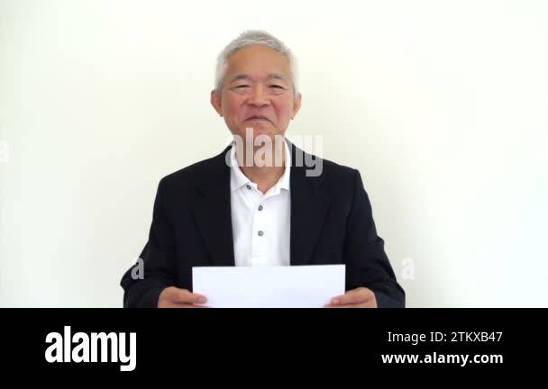 Old Asian senior businessman holding white sign. CEO business owner ...