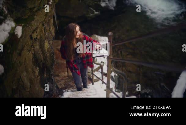 Female traveler finds inner peace in the beauty of nature, hiking through mountain ranges, and ...