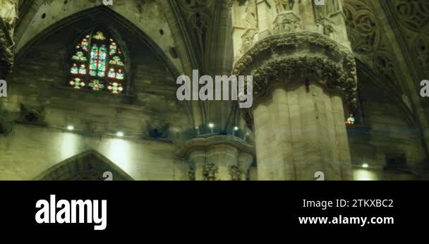 Ancient architecture with powerful columns, stucco and sculptures, tall ...