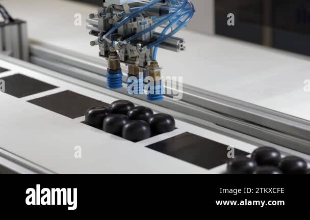 Vacuum Suction Pick and Place Robotic Arm Small Parts at Conveyor Stock ...