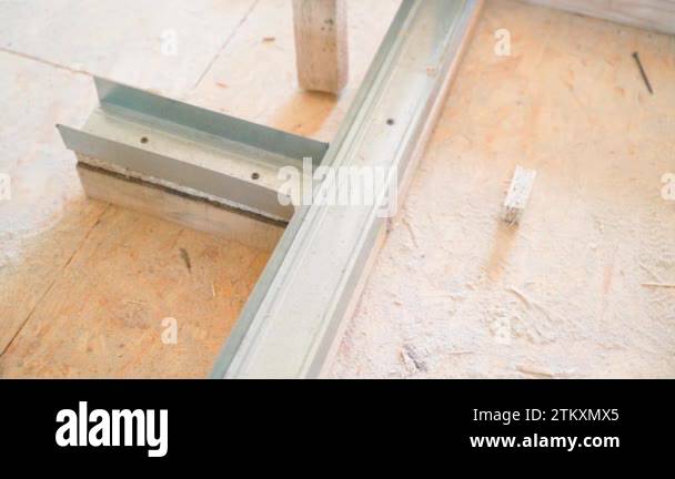 Fastening the frame from the U profile in the floor, frame partition ...