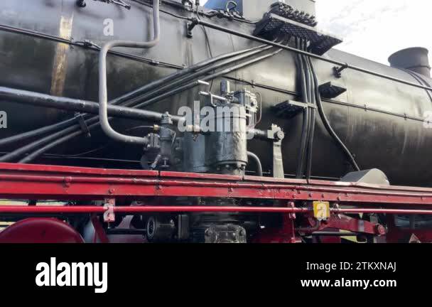 Steam vintage locomotive. German retro engine locomotive preparing for ...