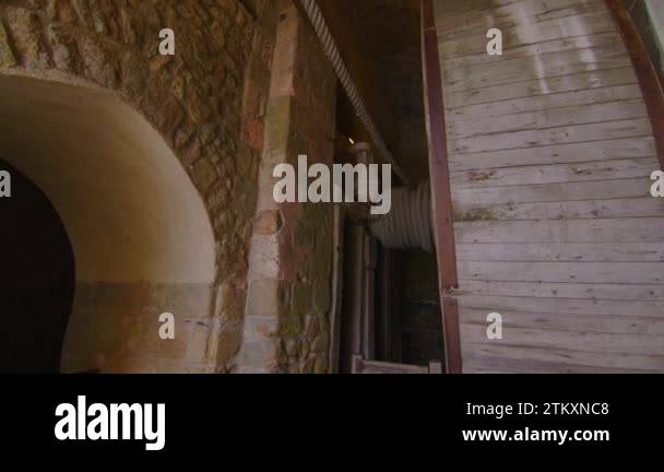 The camera moves inside the church, which is located on top of the Mont ...