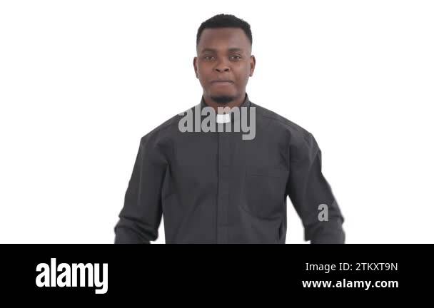Portrait of African American happy priest clapping hands, clenching ...