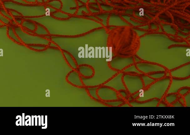Ball of Yarn Threads of Wool on Green Screen Tangle is Rolling by a ...