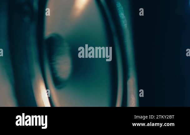 Macro of vibrating speakers membranes of professional sound speaker ...