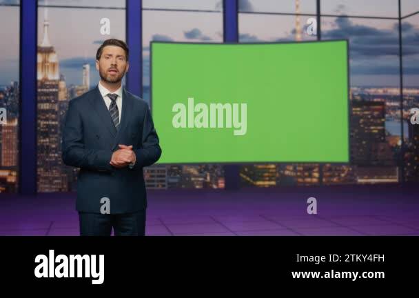 Broadcast presenter reporting daily news at television channel ...
