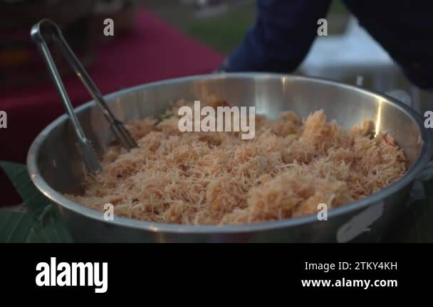 Sweet and sour fried vermicelli noodle Thai festival street food hand ...