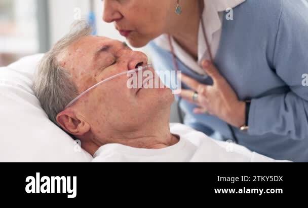 Hospital, kiss and senior couple with love and care with sick man with ...