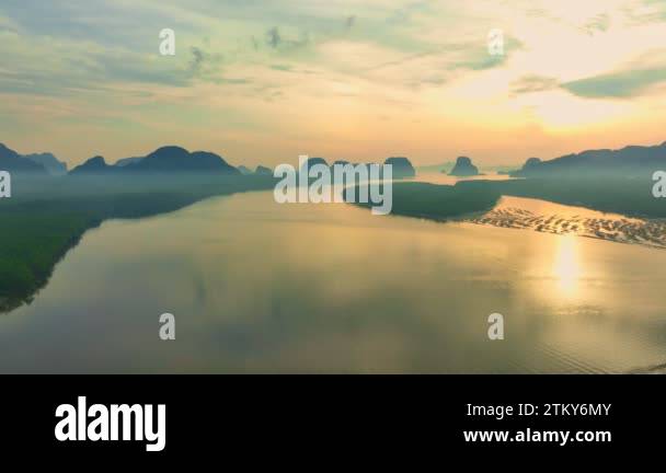 aerial view beautiful sky at twilight above mangrove forest.large canal ...