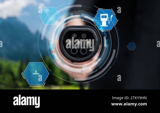 Focus EV charger pointing in front of camera display eco-friendly ...