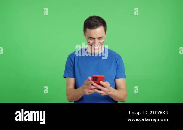 Studio video with chroma background of a japan supporter with the flag ...