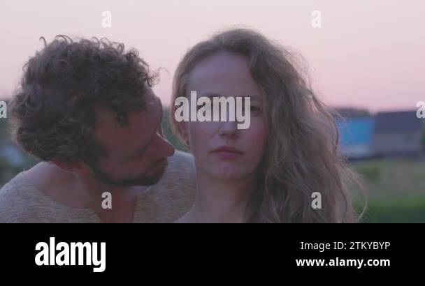 A romantic and sensual moment as a young hetero Caucasian millennial ...