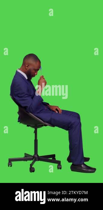 Vertical video: Profile of pensive employee thinking about solutions ...