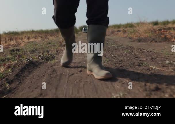 Stepping into the Heart of Farming A Close Up Depiction of a Farmer ...