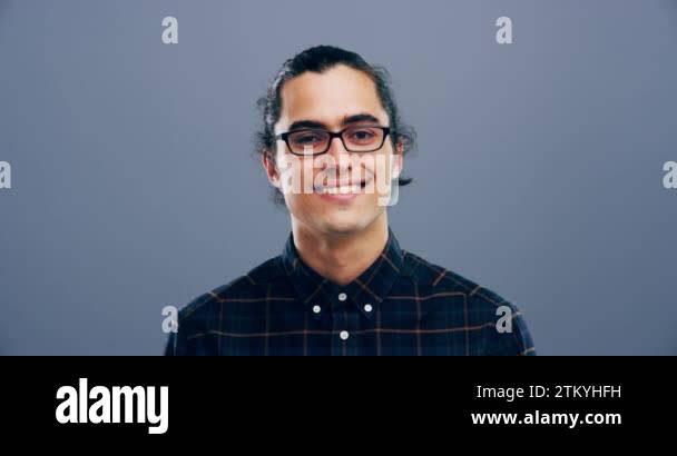 Happy man, face and thumbs up for good job, winning or success isolated ...