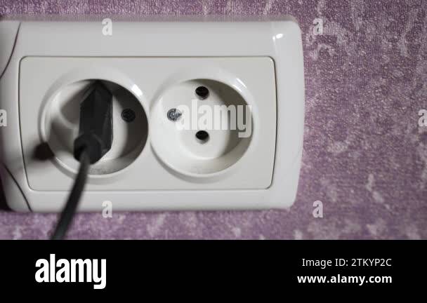 Remove the plug from the electrical appliance from the socket with 220 ...