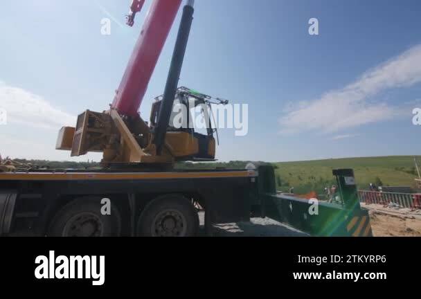 ALMATY, KAZAKHSTAN - AUGUST 16 2023: Truck crane with high hoist and ...
