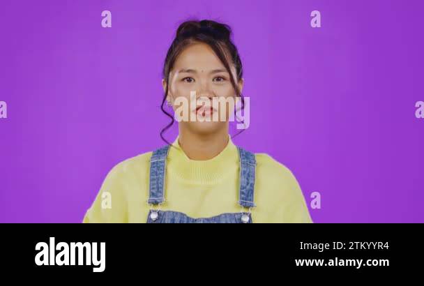 Shock, wow and face of Asian woman on purple background for surprise ...