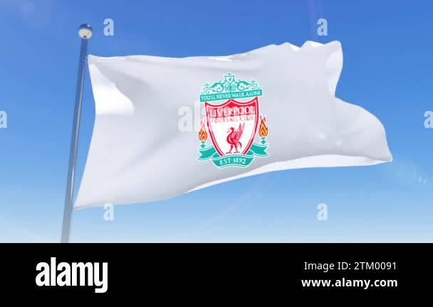The flag of Liverpool Football Club waving isolated on a sky background ...