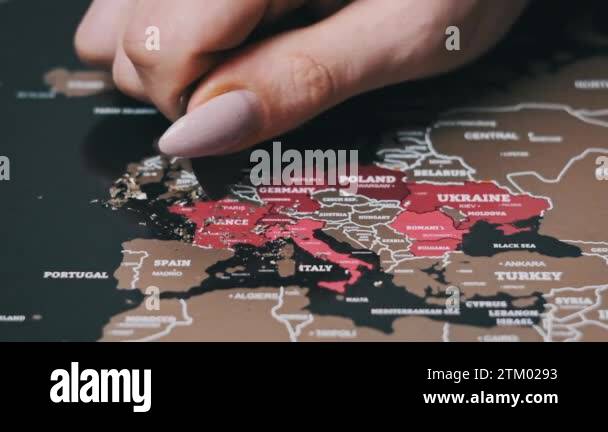 Scratching country of France on the Surface of Scratch World Map ...