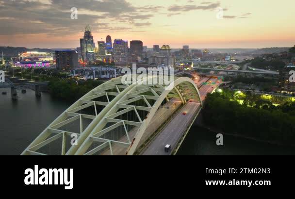 Highway traffic with driving cars on bridge in downtown district of ...