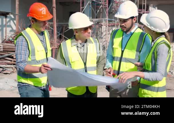 Team group of contractor and architect with foreman explaining about ...