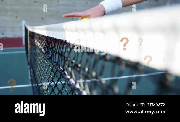 Animation of question mark symbol over cropped hand of caucasian tennis ...