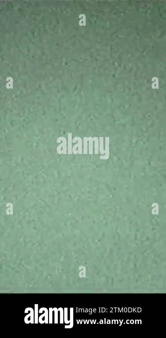 Vertical video. Retro film glitch noise. Old TV interference. Real ...