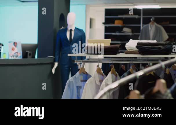 Empty clothing store with casual and formal wear design, retail shop ...